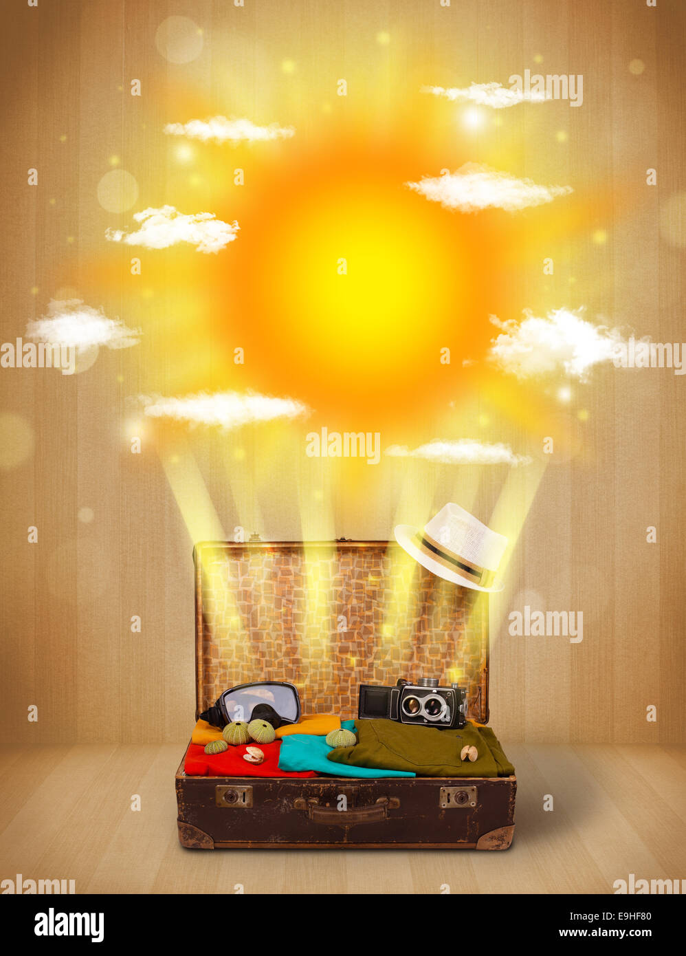 Summer bright sun with clouds and tourist bag Stock Photo - Alamy