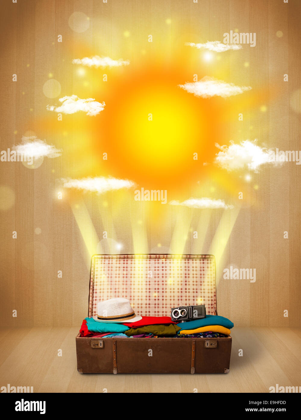 Summer bright sun with clouds and tourist bag Stock Photo - Alamy