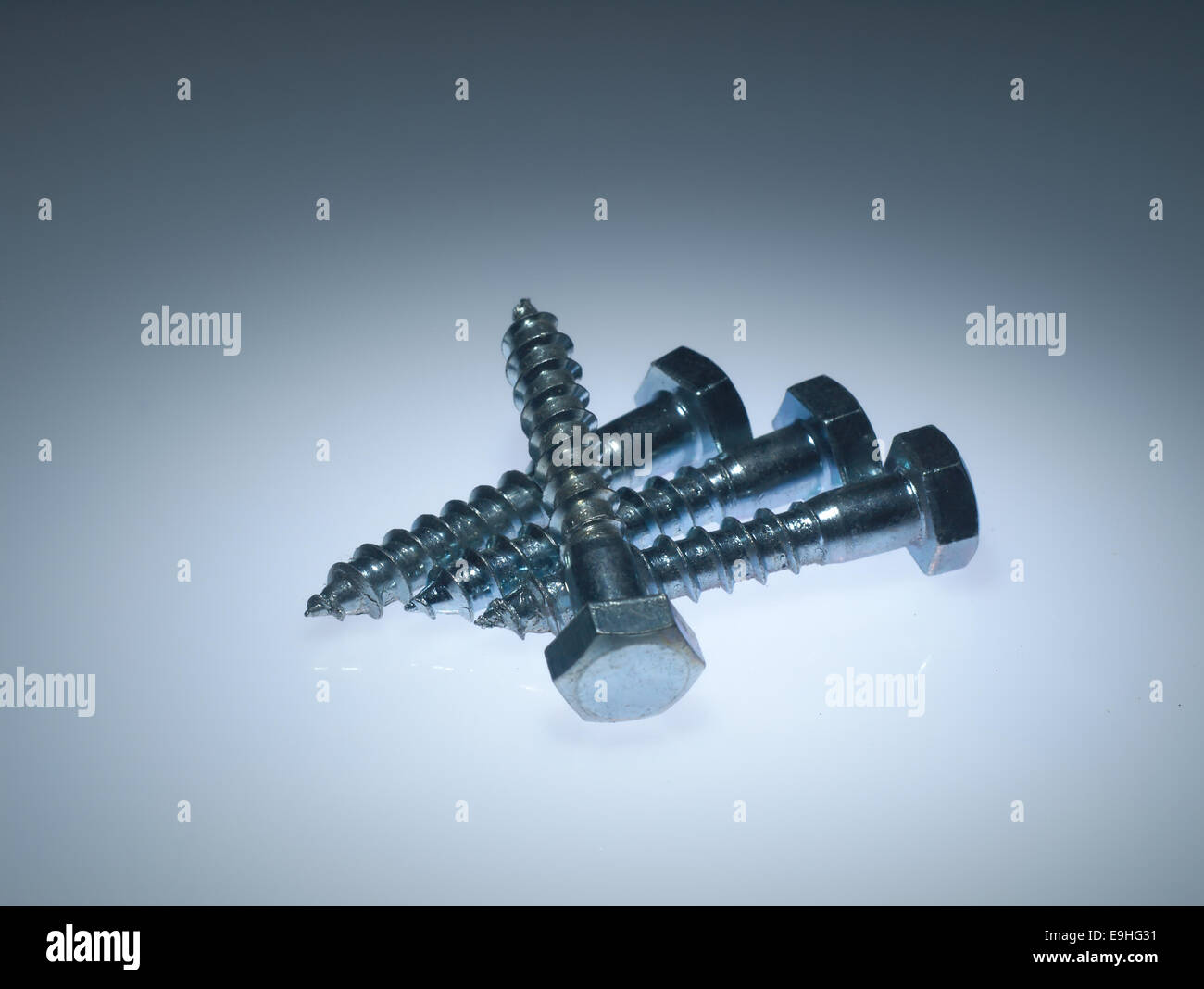 Silver screws as seen from up close Stock Photo - Alamy