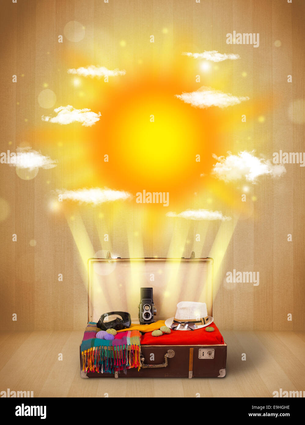 Summer bright sun with clouds and tourist bag Stock Photo - Alamy