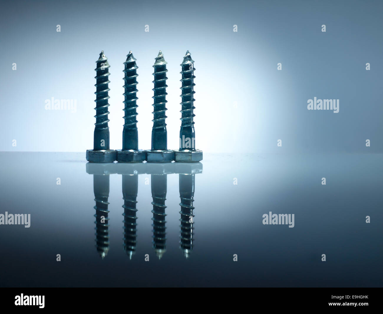 Silver screws as seen from up close Stock Photo - Alamy