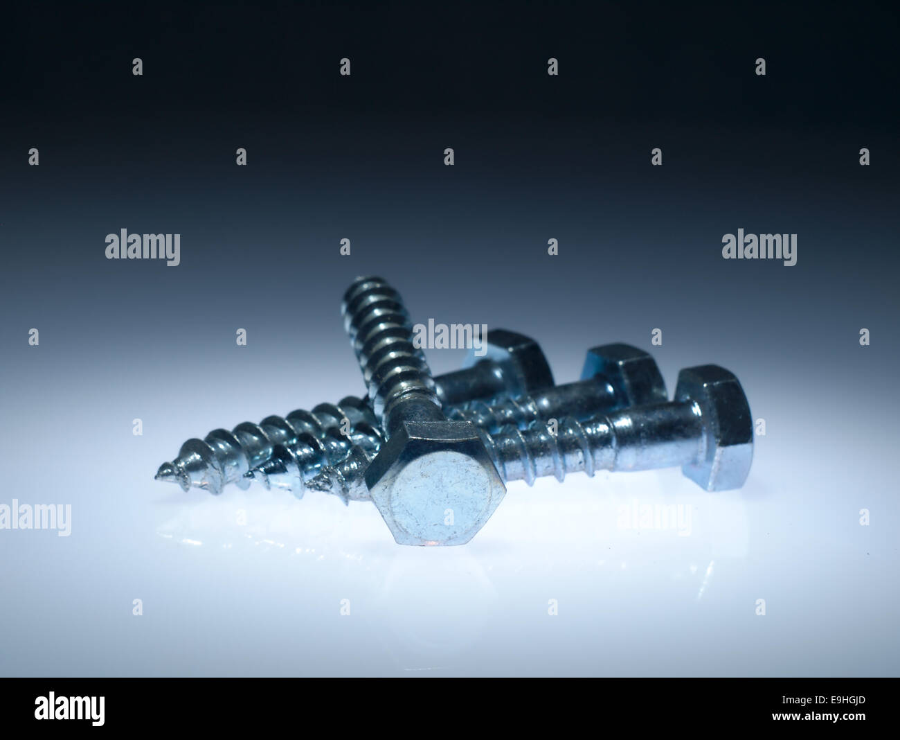 Silver screws as seen from up close Stock Photo - Alamy
