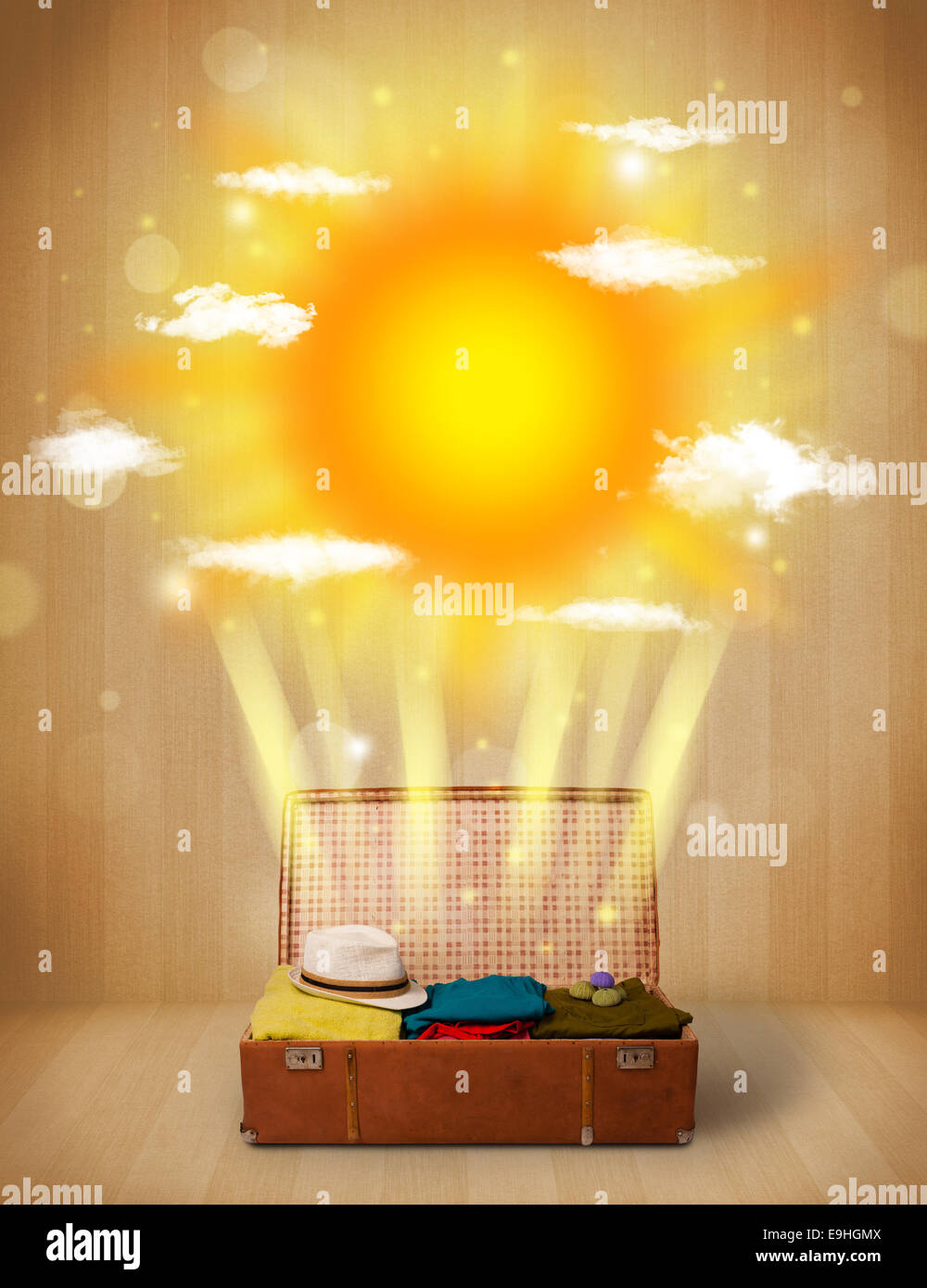 Summer bright sun with clouds and tourist bag Stock Photo - Alamy