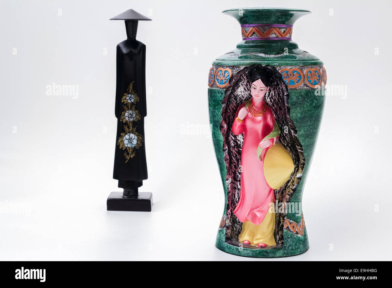 Vase with carved bas-relief of Vietnamese girls Stock Photo - Alamy