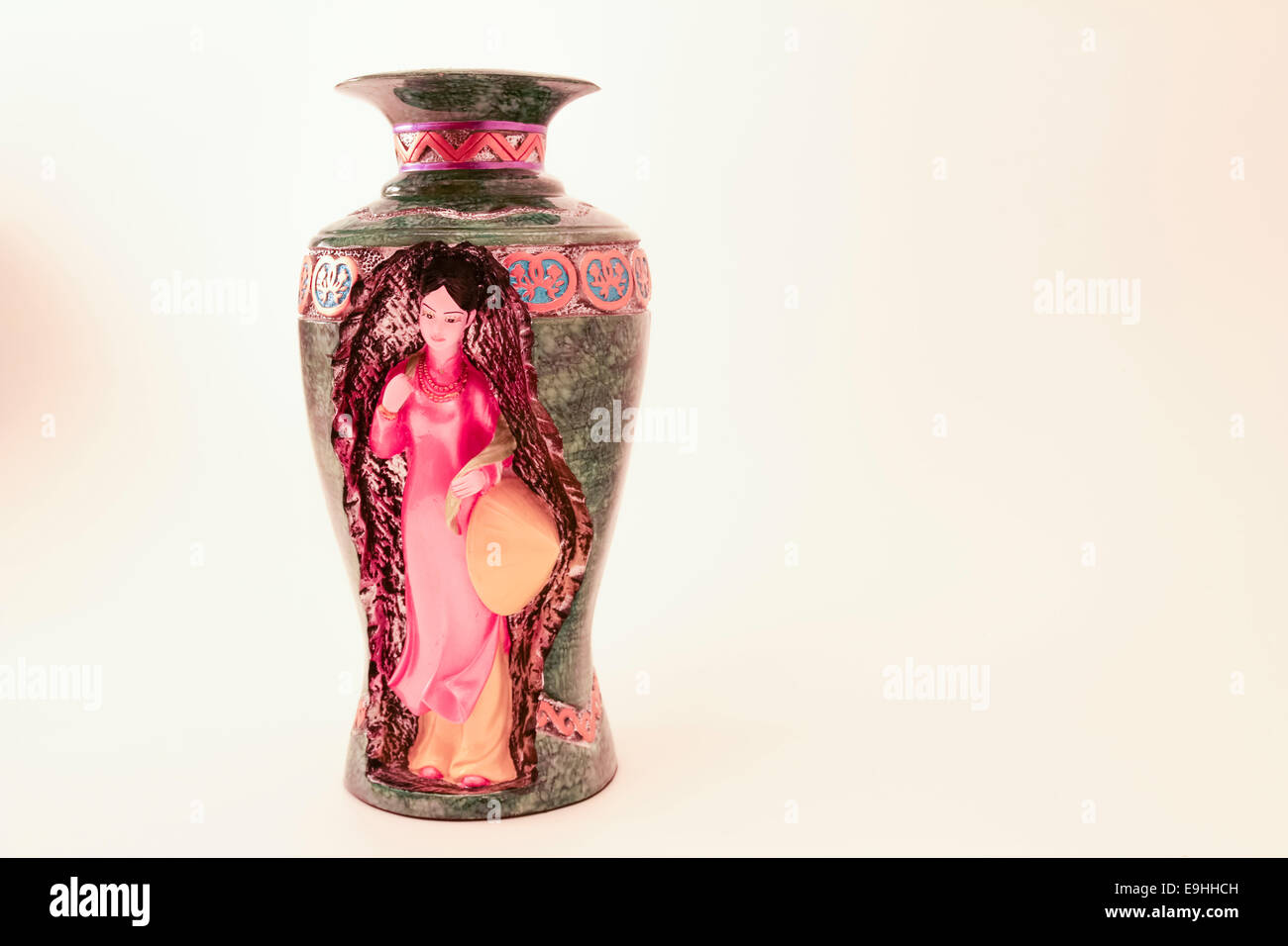 Vase with carved bas-relief of Vietnamese girls Stock Photo - Alamy