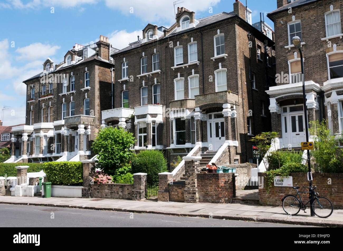Lawn Road, a street of 3 storey Victorian housing in north London Stock ...