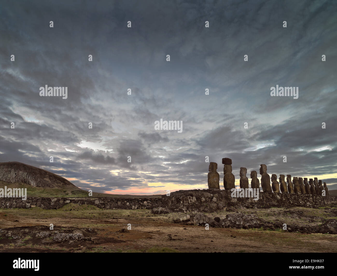 Easter Island. View of the stone sculptures in the rays of the rising ...