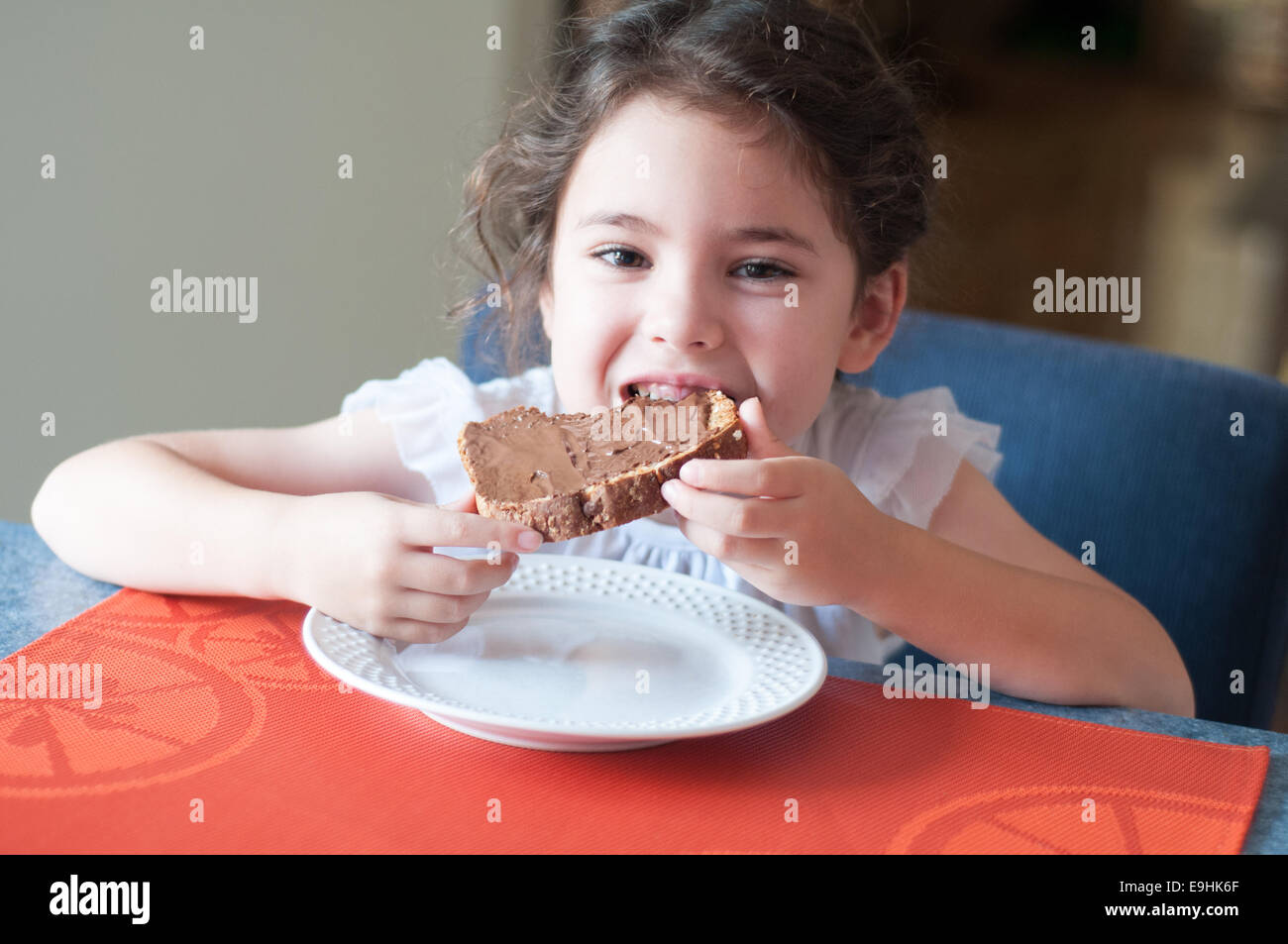 Child eating chocolate hi-res stock photography and images - Alamy