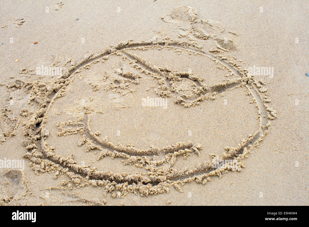 drawing a pirate in the sand on beach Stock Photo - Alamy