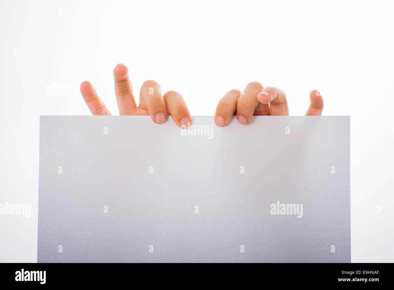 woman tearing sheet of white paper Stock Photo - Alamy