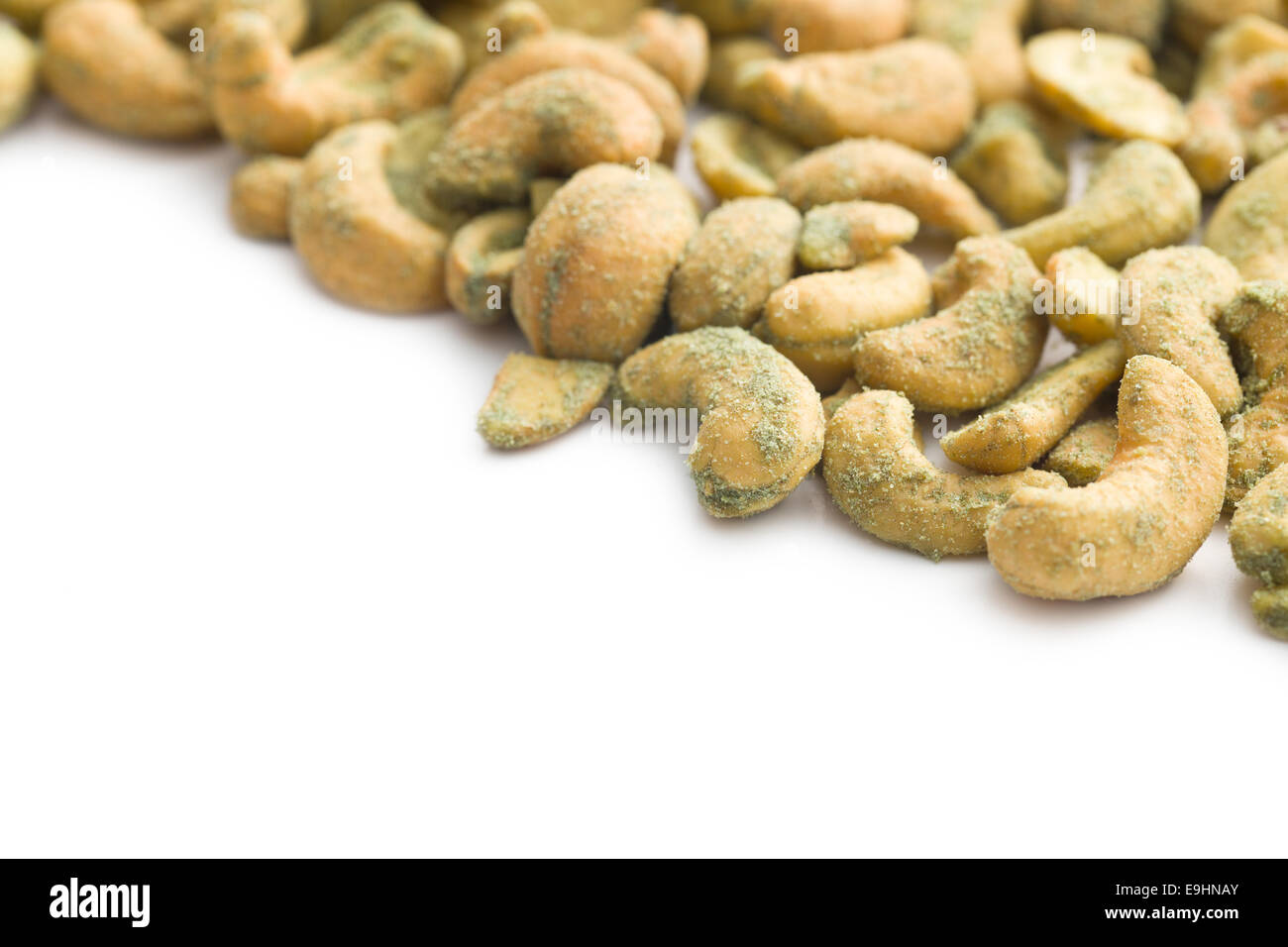 cashew nuts coated wasabi on white background Stock Photo - Alamy
