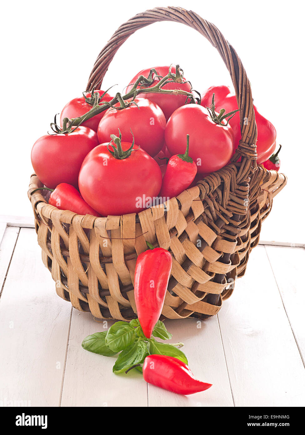 Peppers in a basket hi-res stock photography and images - Alamy