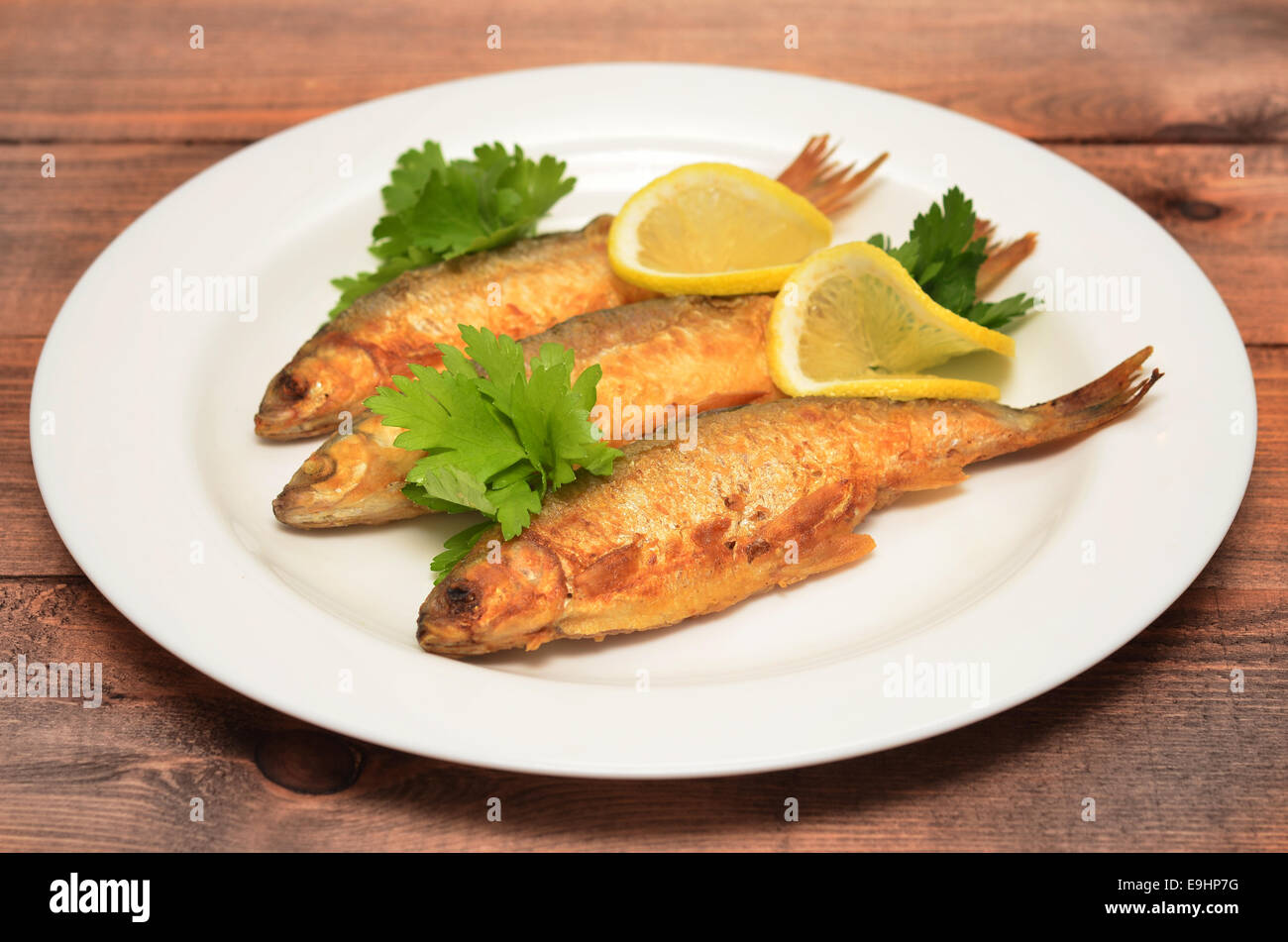Juicy fried fish hi-res stock photography and images - Alamy