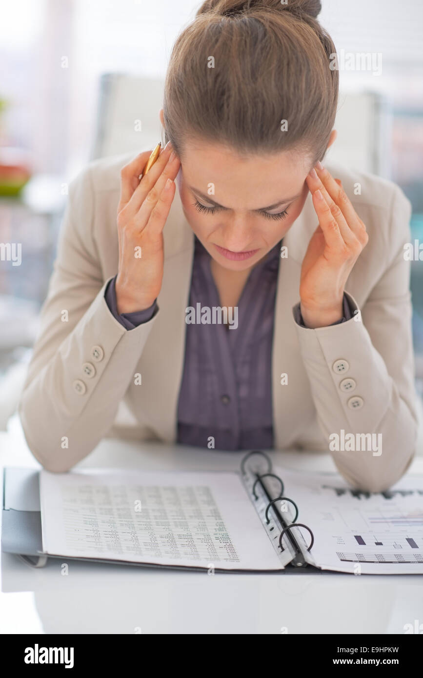 Portrait of stressed business woman in office Stock Photo - Alamy