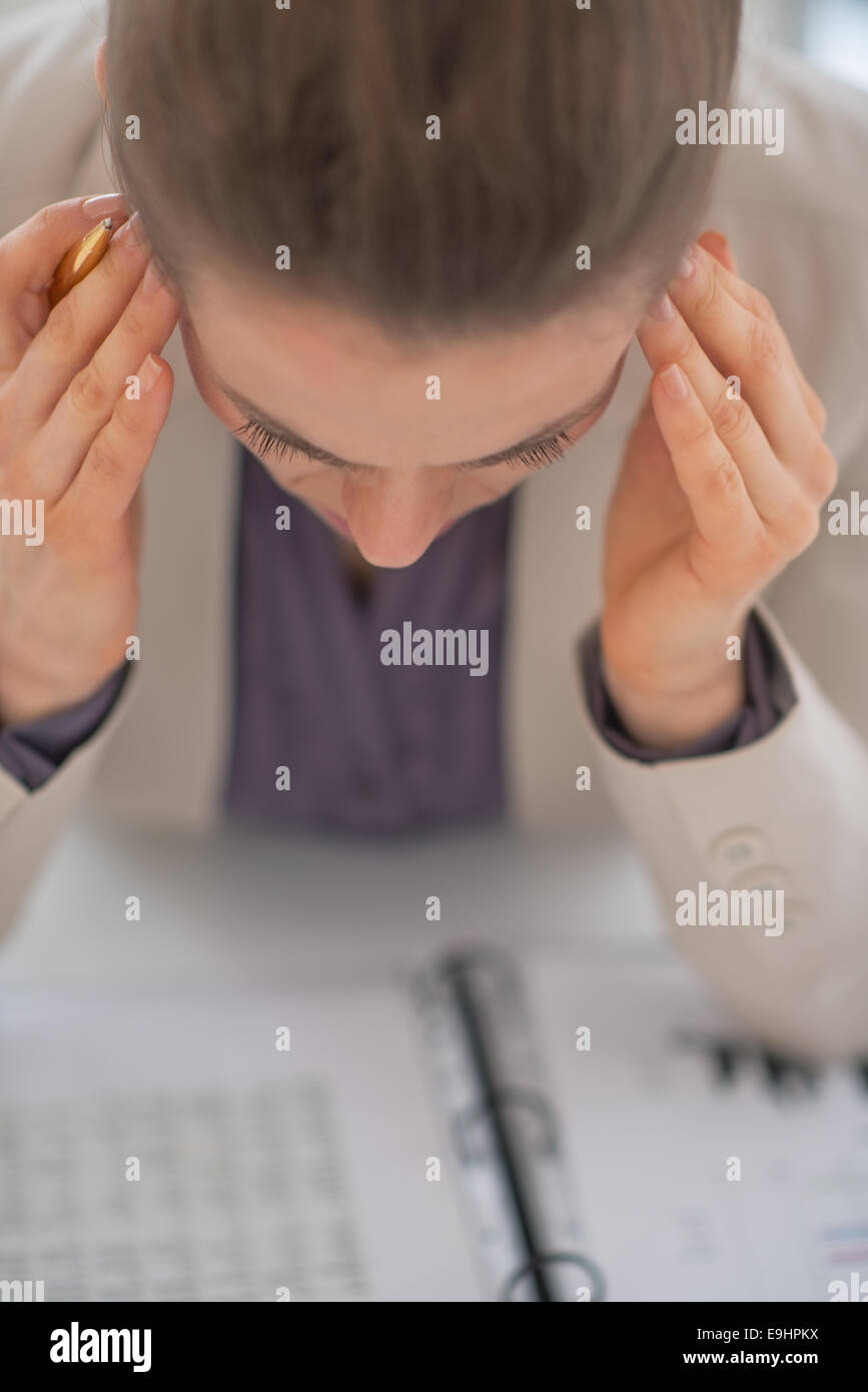 Portrait of stressed business woman in office Stock Photo - Alamy
