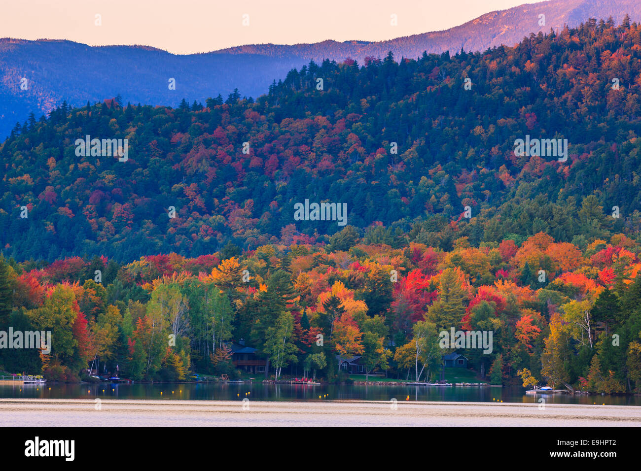 Autumn colors at Mirror Lake in Lake Placid in Adirondacks State Park ...