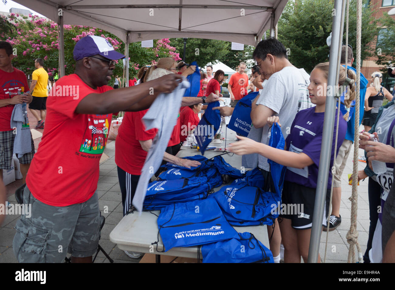 Kentlands 5K racers getting their race packets Stock Photo - Alamy