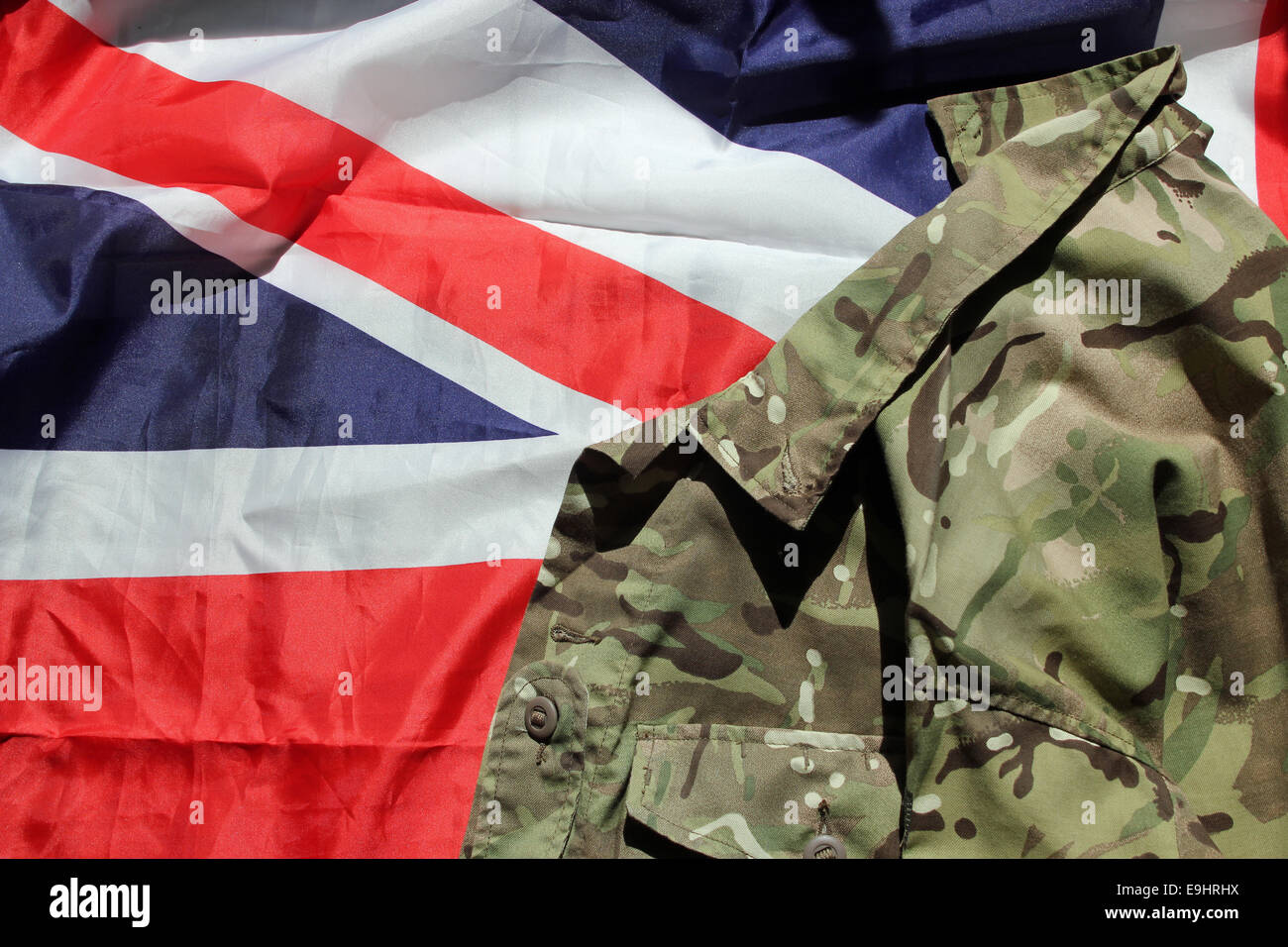 UK military uniform against the Union Jack flag symbolizing the British ...