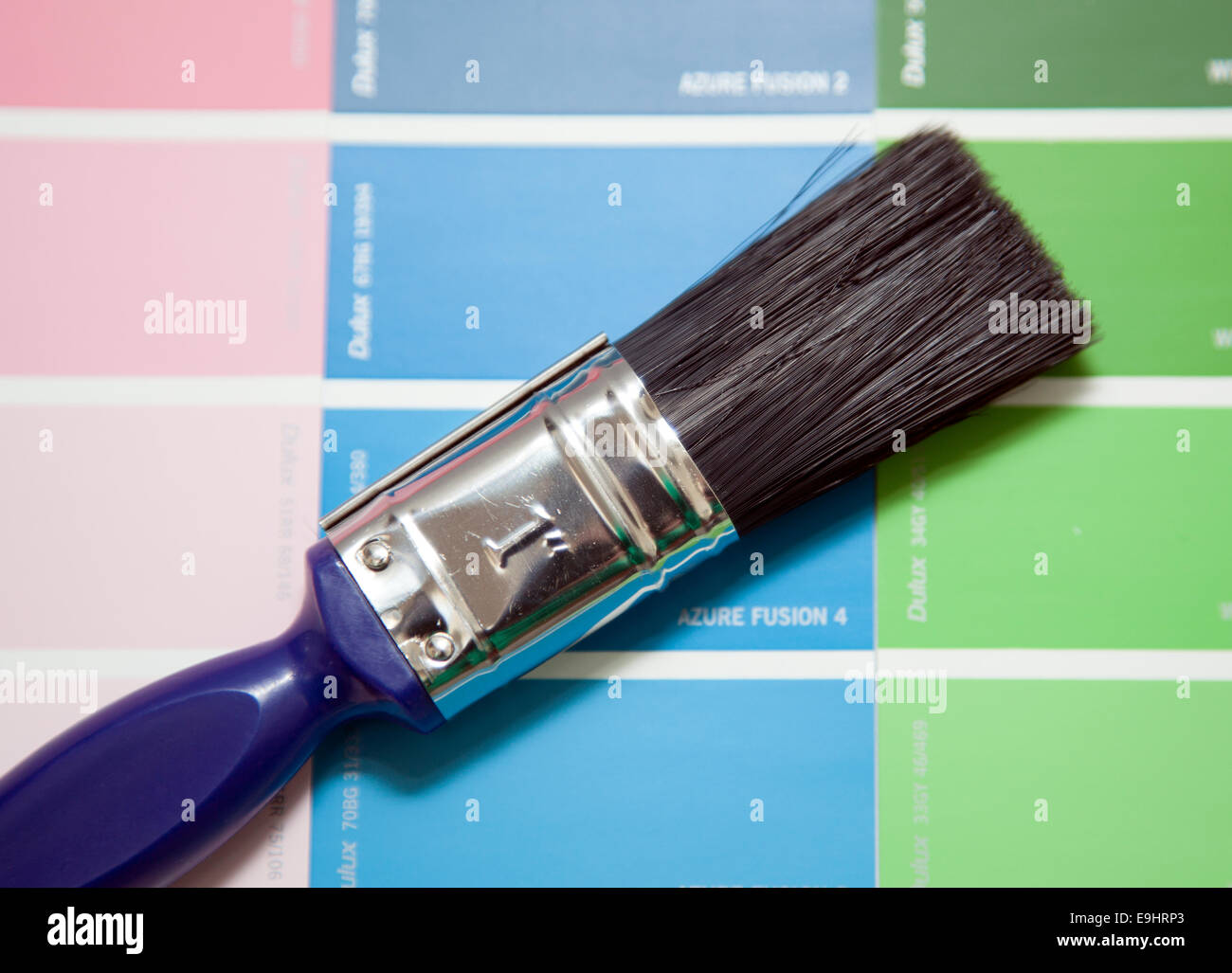 Paint colour cards and paintbrush, London Stock Photo - Alamy