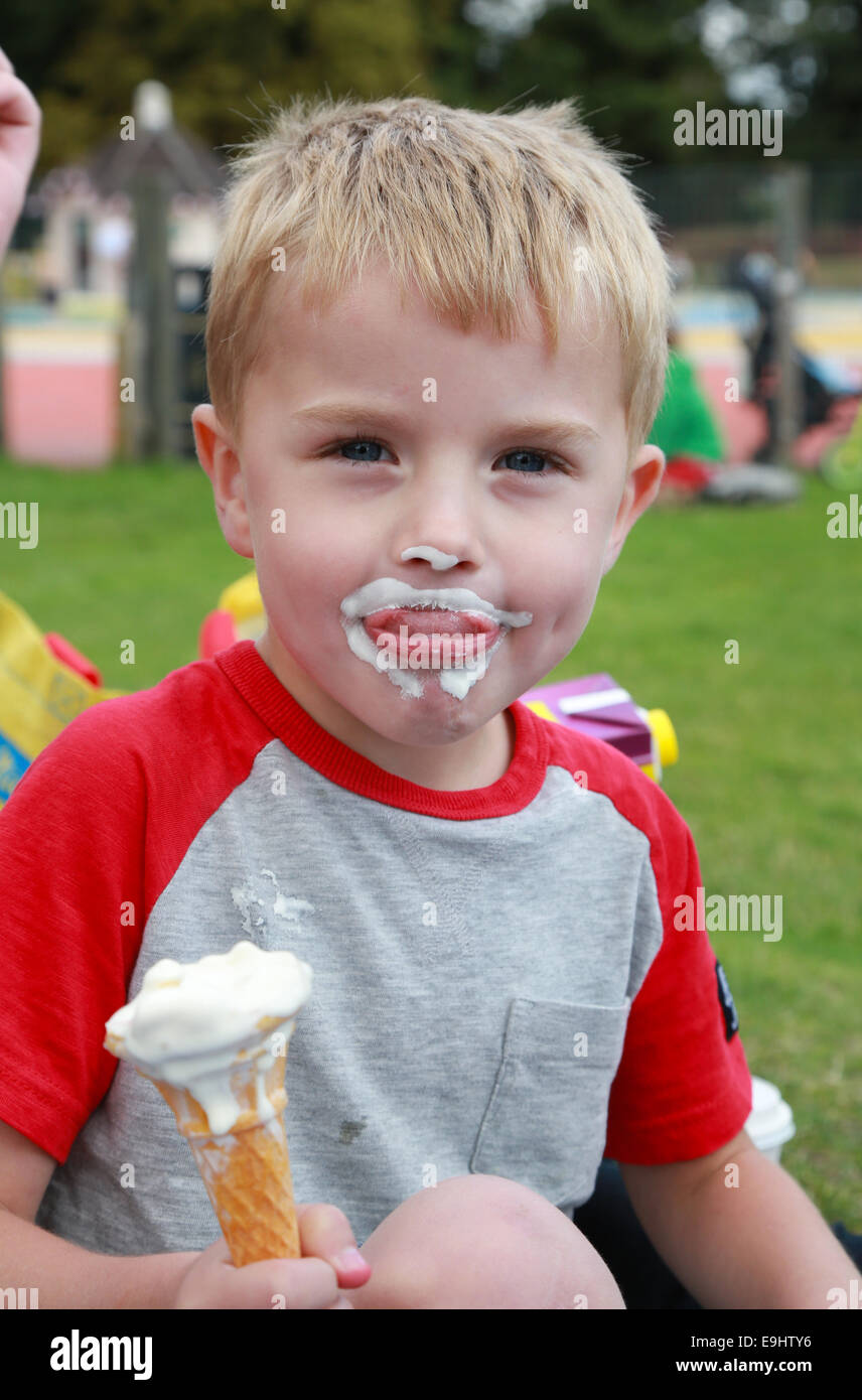 Child eating ice cream Stock Photo - Alamy