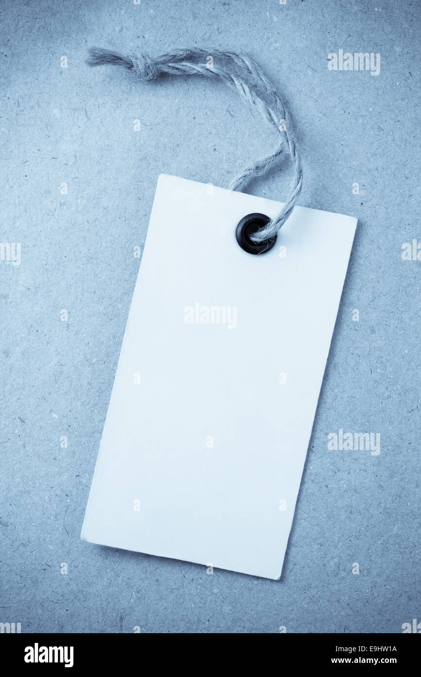 price tag label at paper textured background Stock Photo - Alamy