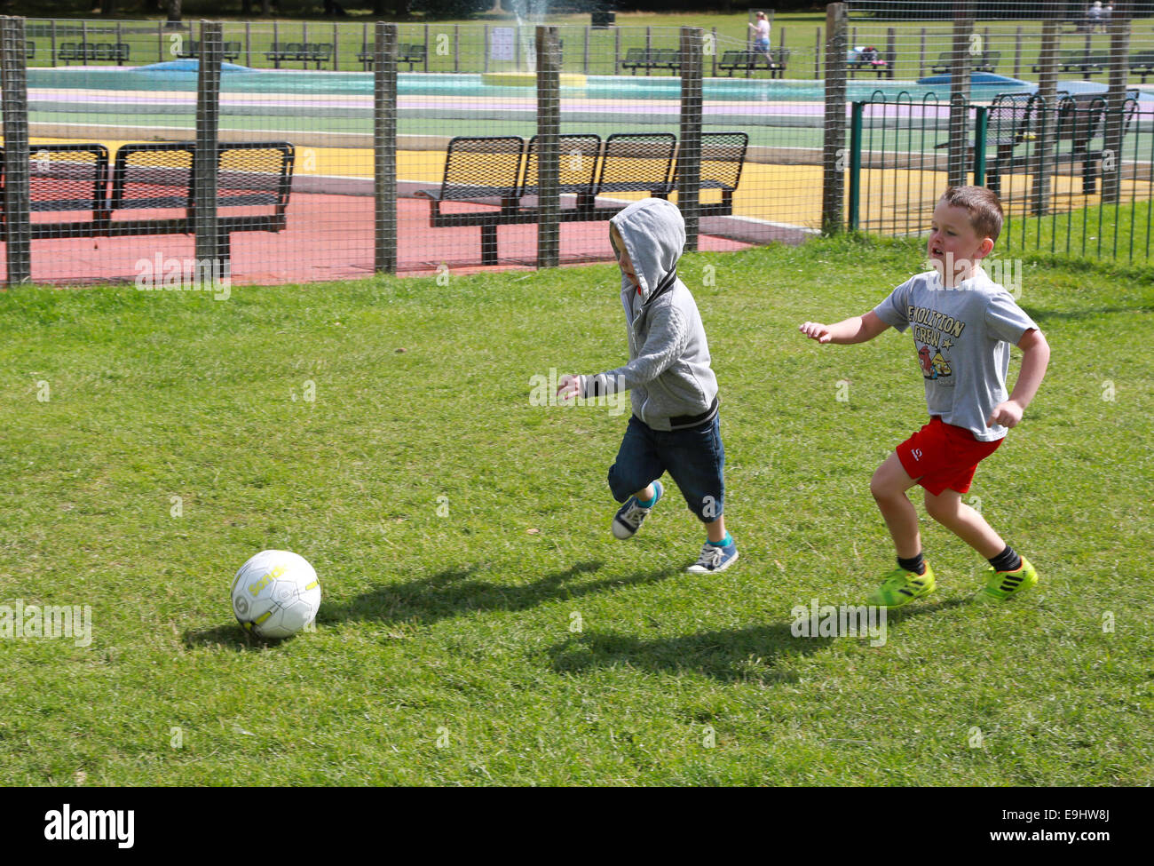 Children playing football Stock Photo - Alamy