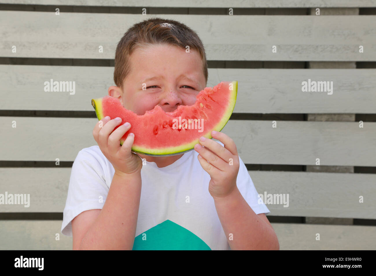Child eating watermelon hi-res stock photography and images - Alamy