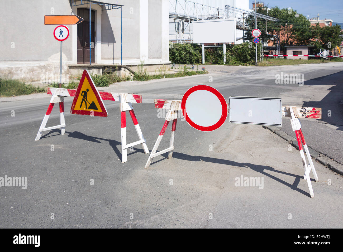 Road works sign for construction works in street Stock Photo - Alamy