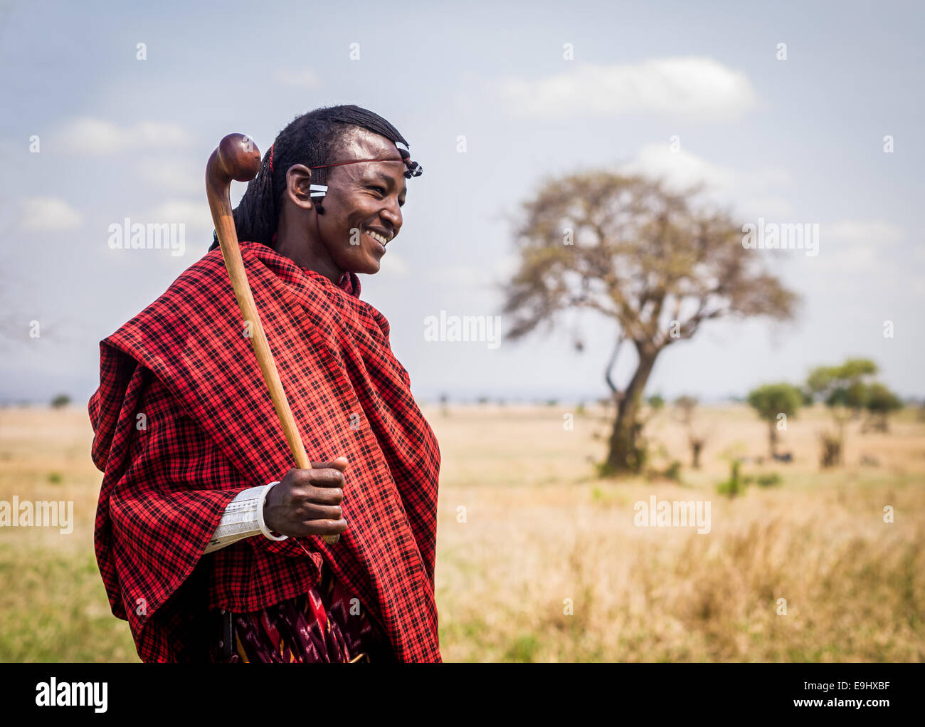 Maasai warrior in traditional clothes, Mikumi, Tanzania Stock Photo ...