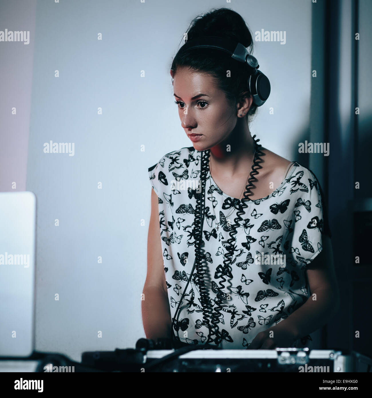 Female dj at work in night club. Shallow depth of field Stock Photo - Alamy