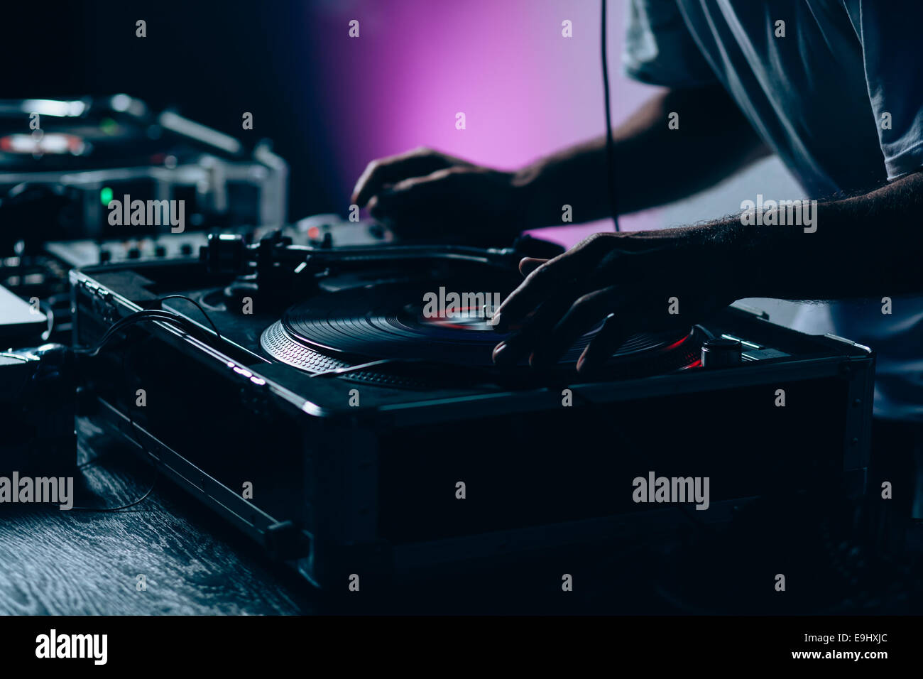 Male dj at work in night club. Shallow depth of field Stock Photo - Alamy