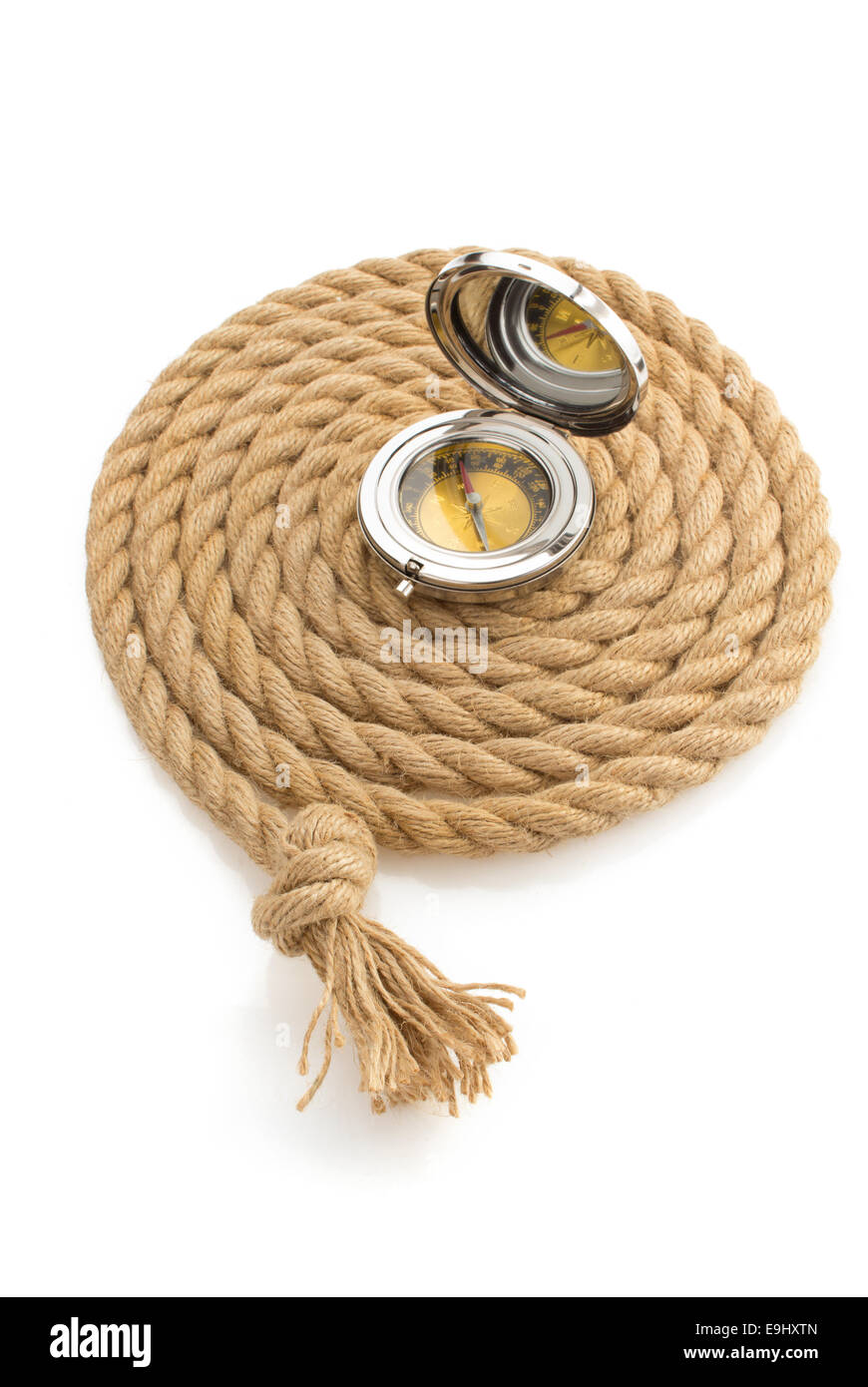 compass and ship rope isolated on white background Stock Photo - Alamy