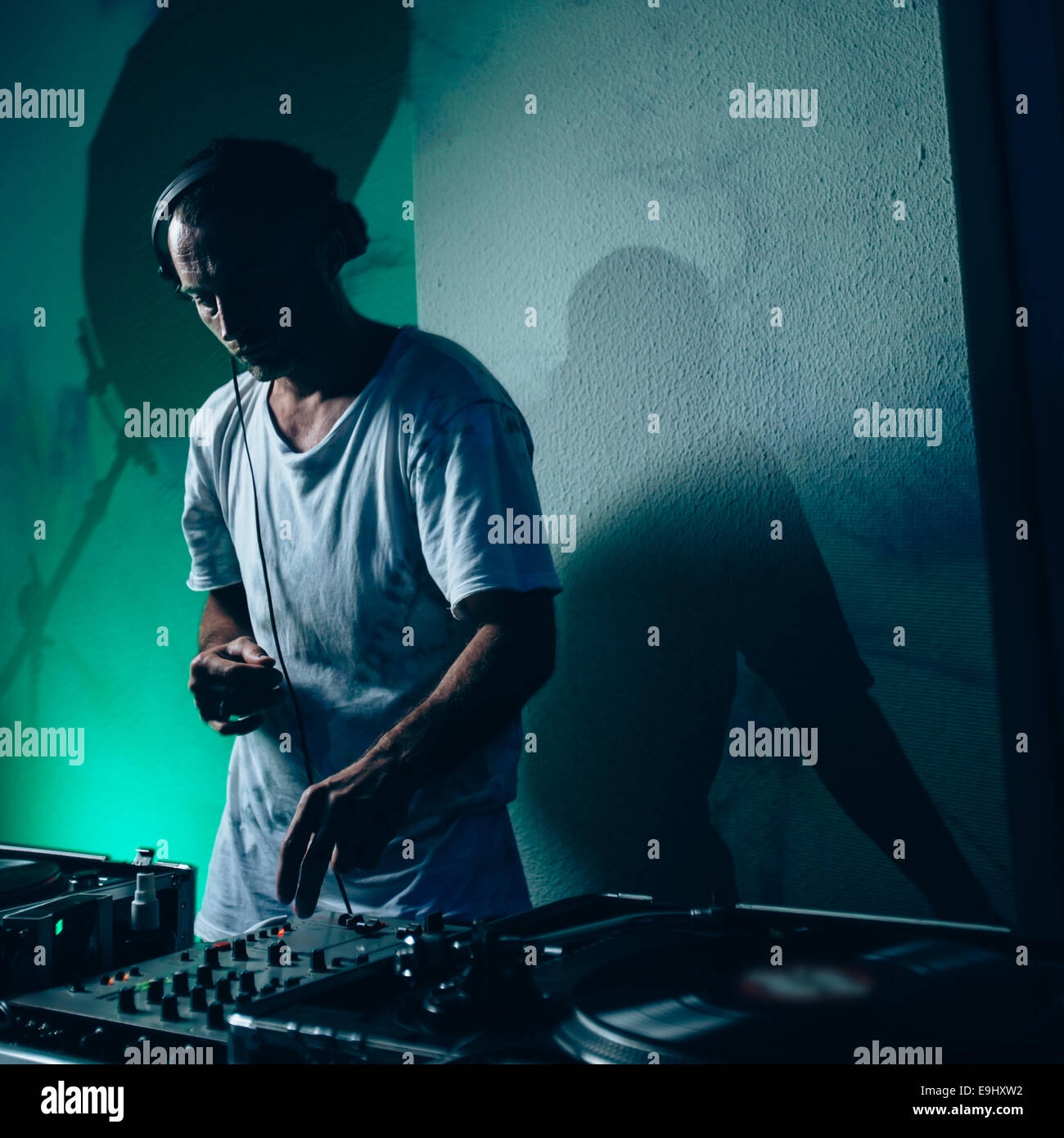 Male dj at work in night club. Shallow depth of field Stock Photo - Alamy