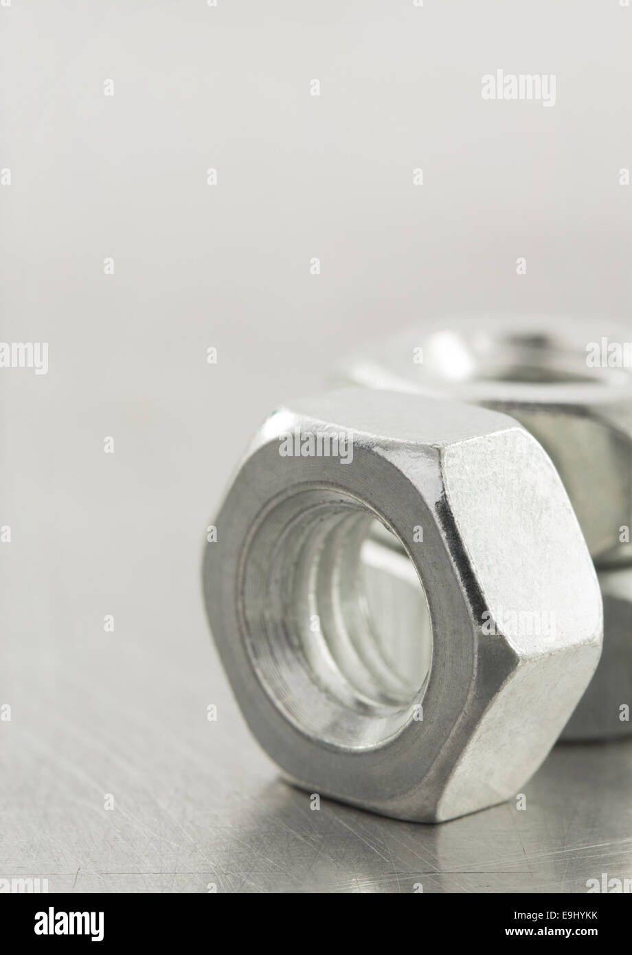 nuts tool at metal background texture Stock Photo - Alamy