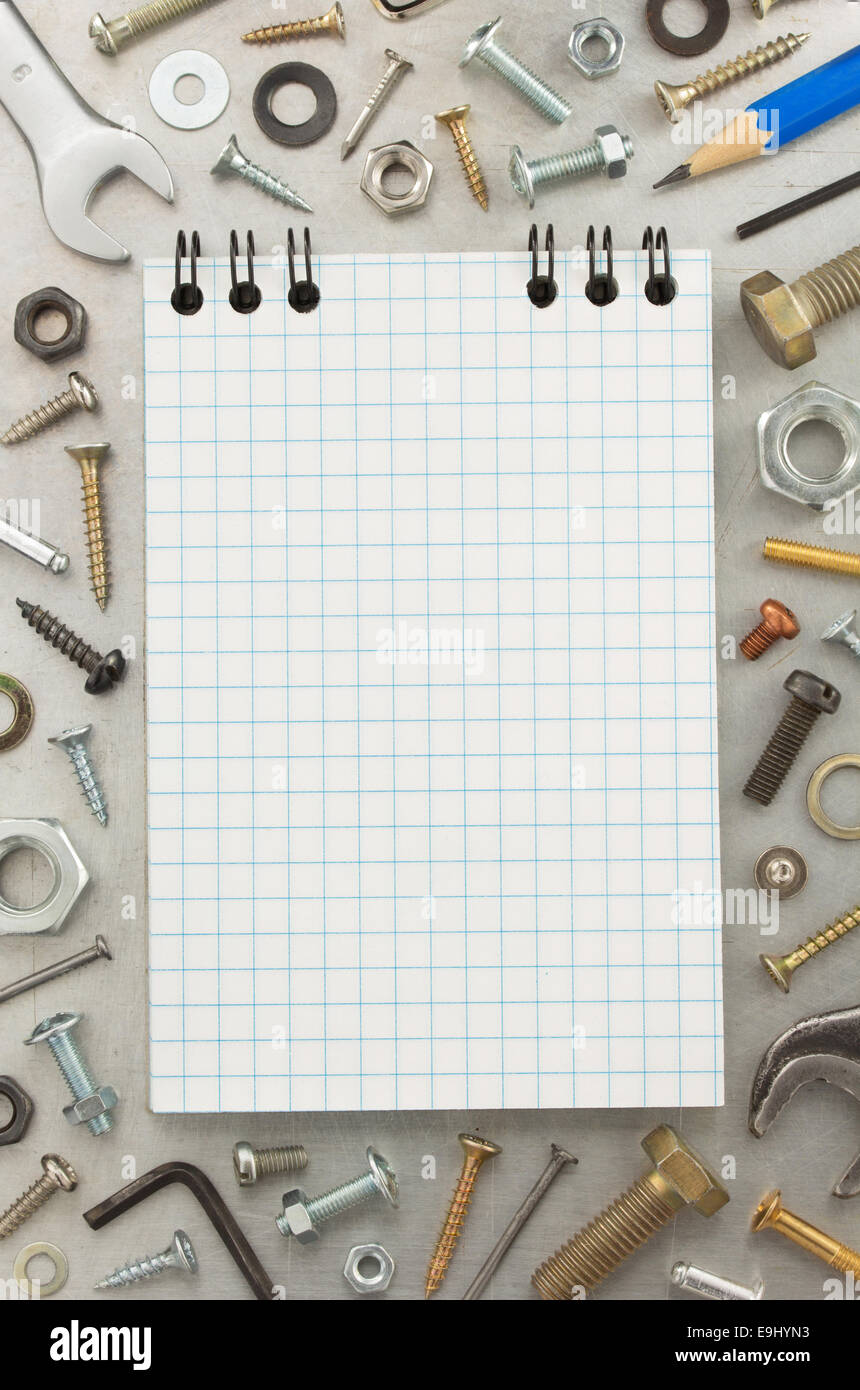 hardware tools and notebook at metal background texture Stock Photo - Alamy