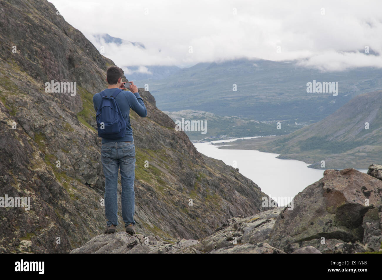 Man stood on edge of cliff hi-res stock photography and images - Alamy