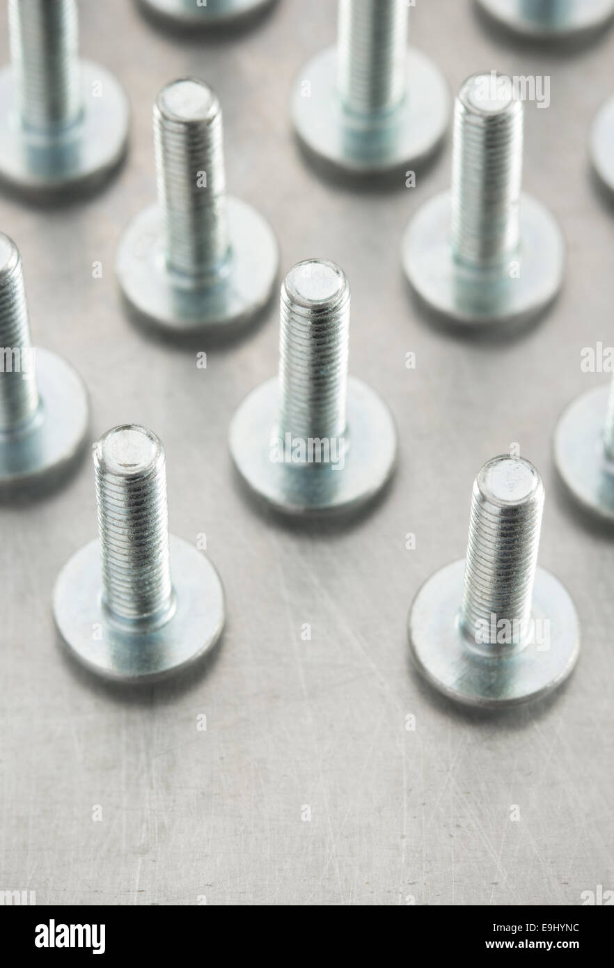 bolts tool at metal background texture Stock Photo - Alamy