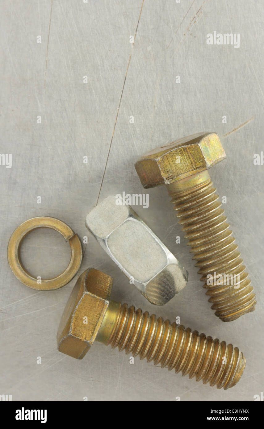 bolts tool at metal background texture Stock Photo - Alamy