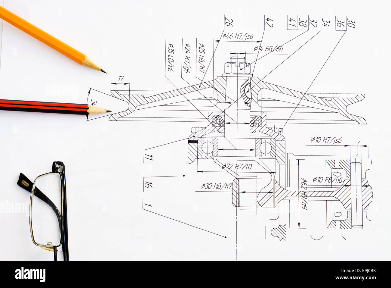 pen and glasses over drawing Stock Photo - Alamy