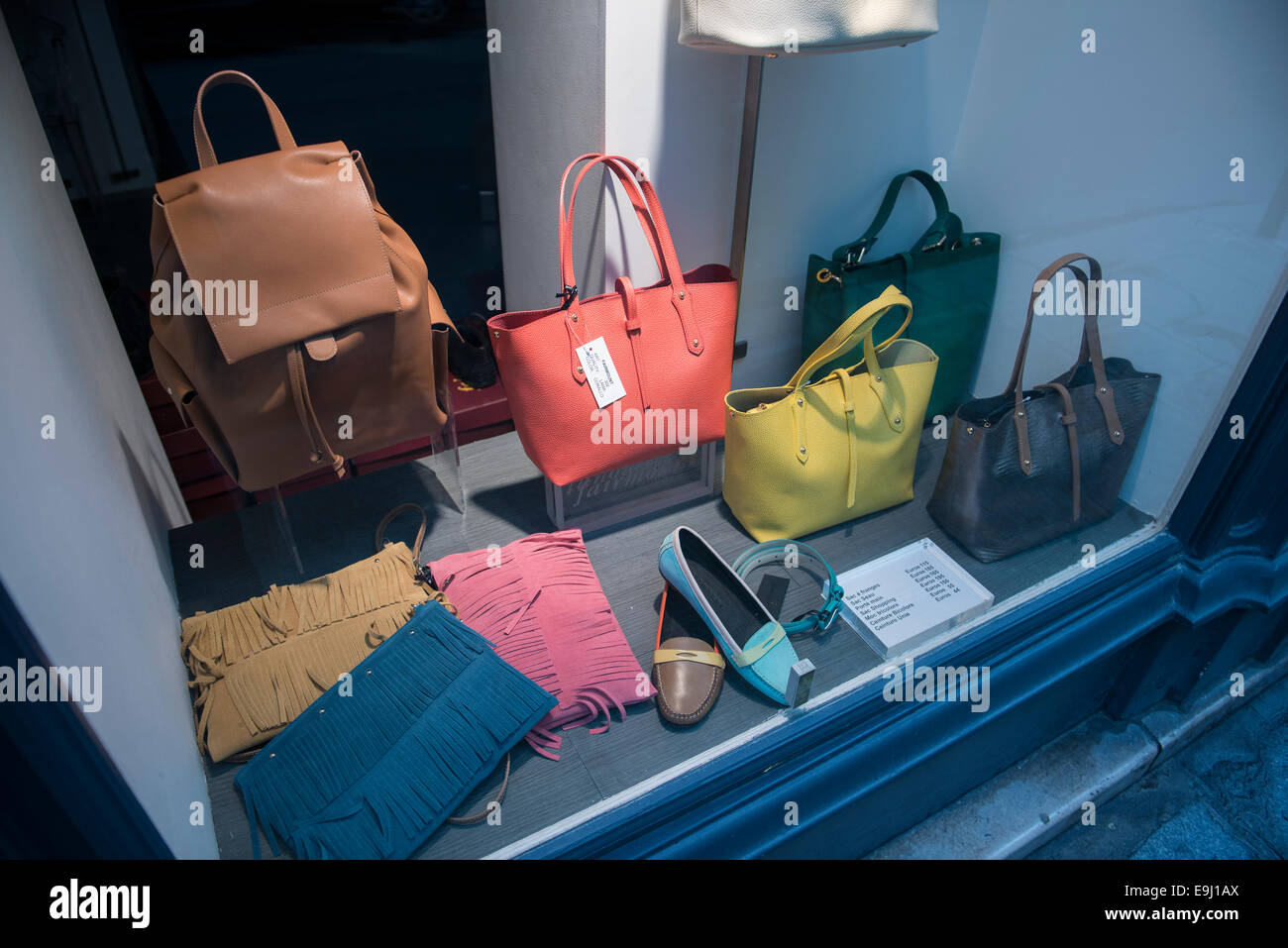 shop windows selling fashion retail in Paris france Stock Photo - Alamy