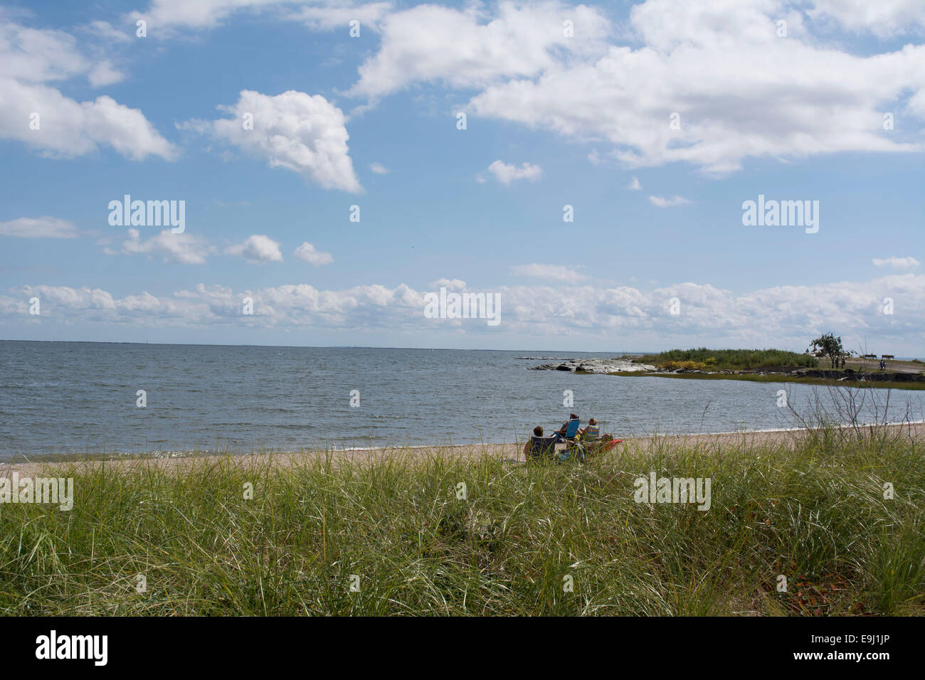 Relaxing on ocean shore hi-res stock photography and images - Alamy