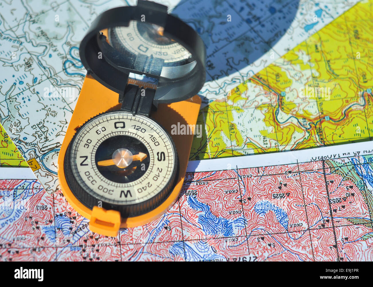 The compass on the map. Open the compass lies on topographic maps and ...