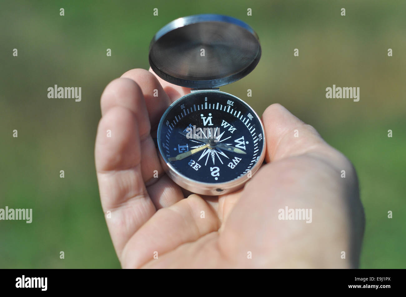 The compass in the palm of your hand. Open the compass helps not to get ...