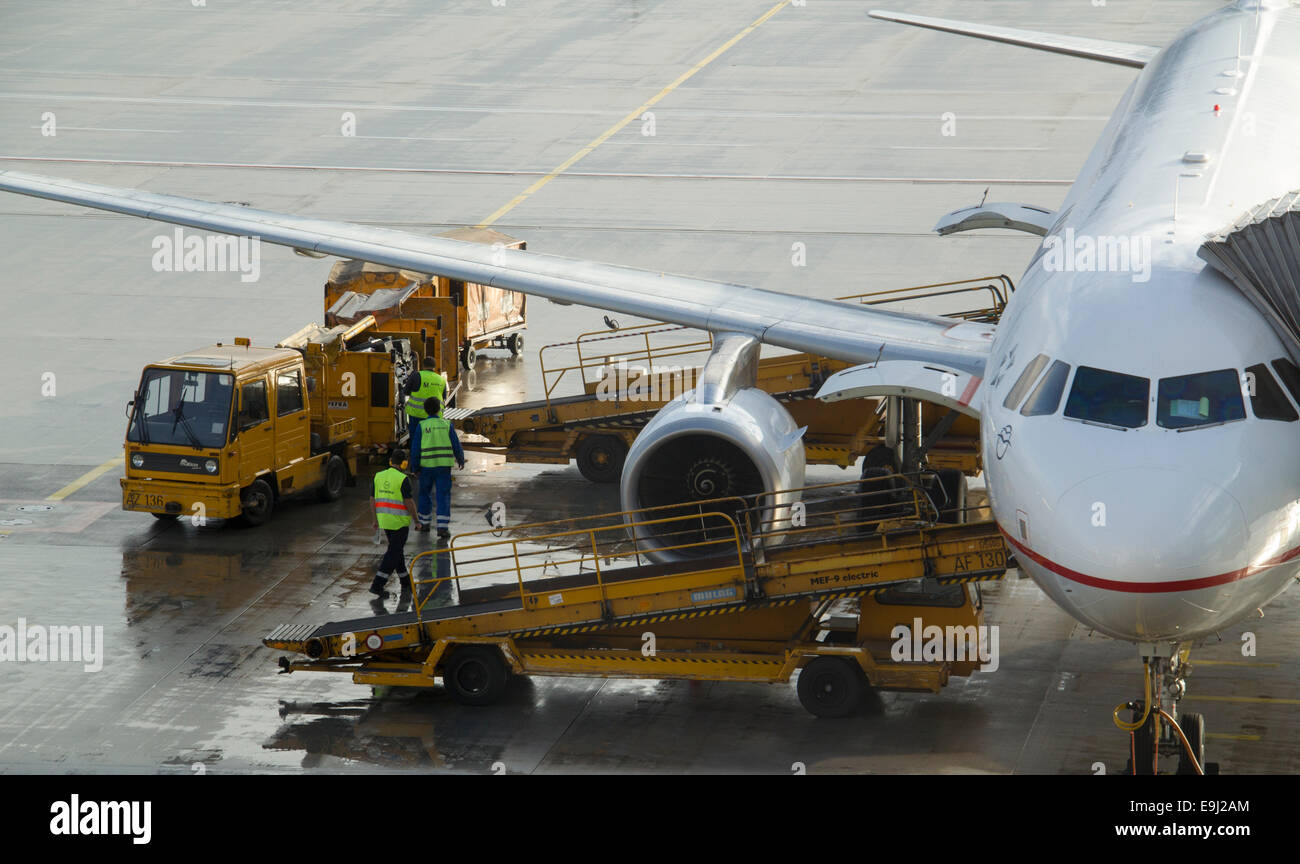 Munich, Germany - October 16, 2014: Ground crew refueling and working ...