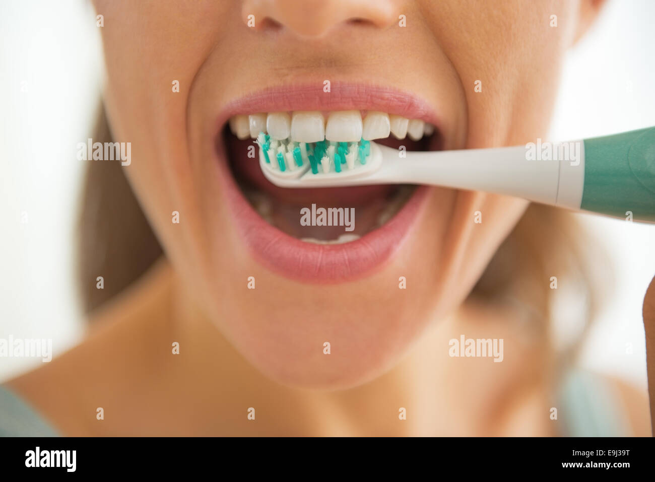Closeup on woman brushing teeth Stock Photo - Alamy