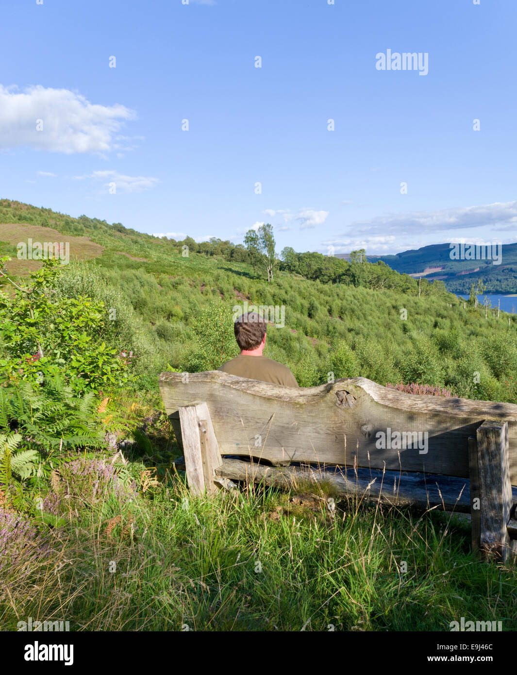 Caucasian Man Sitting on a Bench at Lendrick Hill, Glen Finglas ...