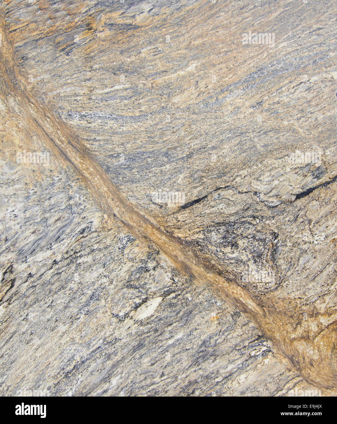 A full slab of cut and polished Granite makes a background of textures ...