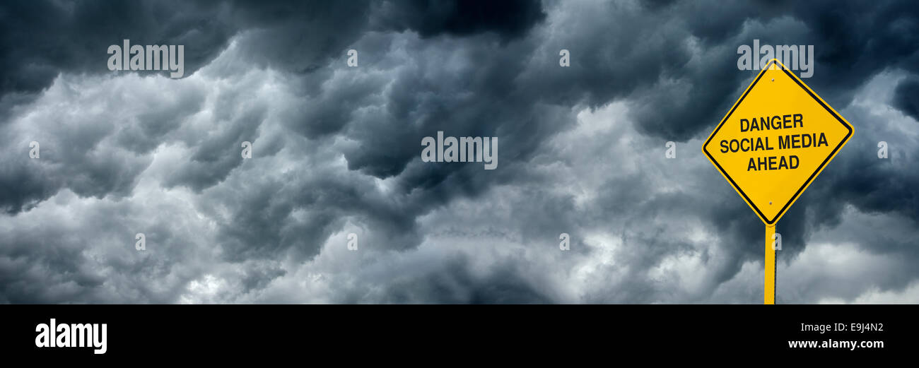 Social Media: Caution Sign in front of storm clouds warning of "Social ...