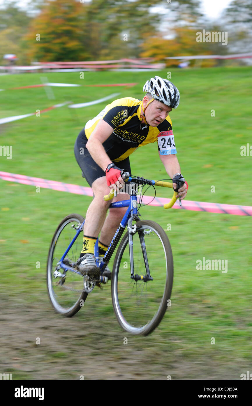 cyclist racing at speed in a cyclocross race Stock Photo - Alamy