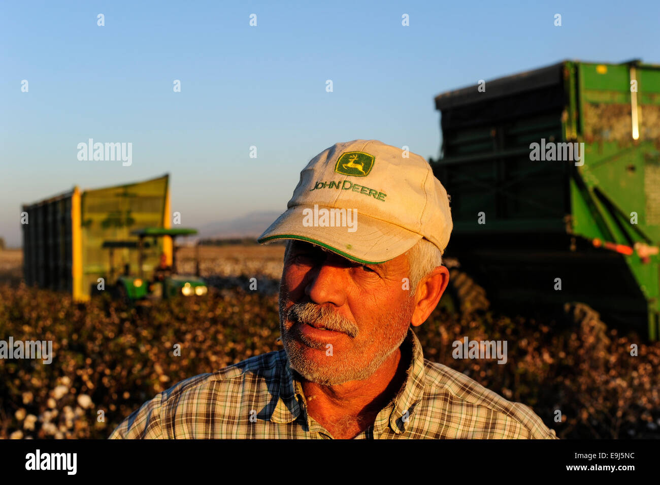 TURKEY, Menemen, harvest of conventional cotton with John Deere cotton ...